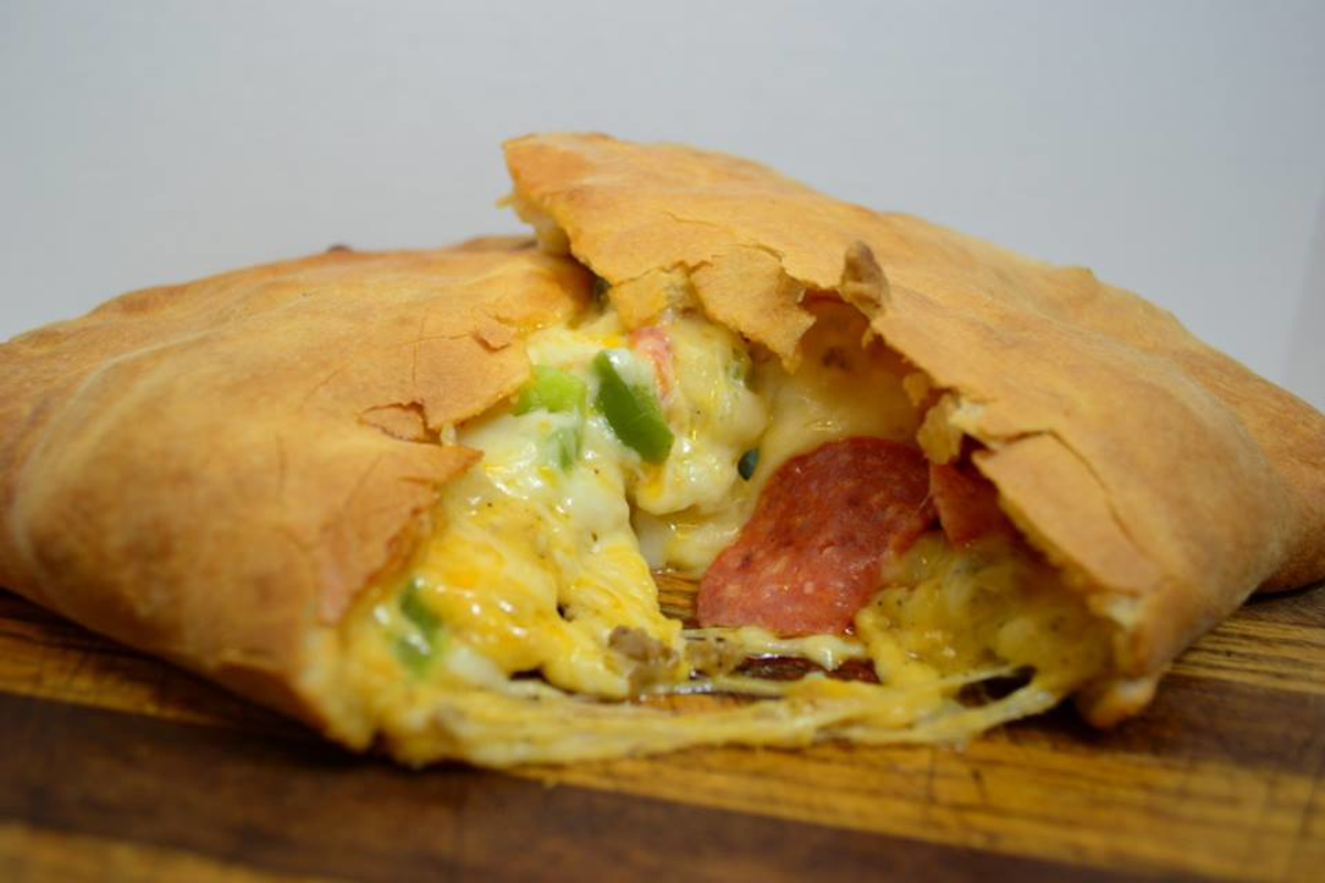 D.P. Dough offering free calzones to celebrate grand opening | Creative ...